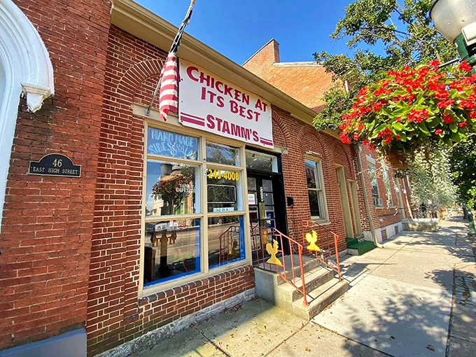 The unassuming brick facade of Grandma Stamm's promises "CHICKEN AT ITS BEST" - a humble claim that somehow manages to be an understatement.