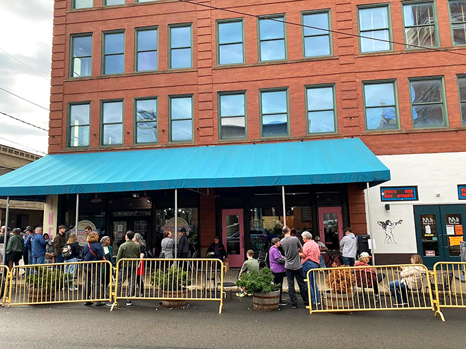 The line outside Pamela's isn't a bug, it's a feature. That turquoise awning signals breakfast nirvana awaits those patient enough to queue.