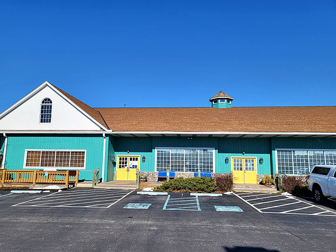 The turquoise exterior of Bay City stands like a coastal mirage in Pennsylvania, promising seafood treasures within its unassuming walls.