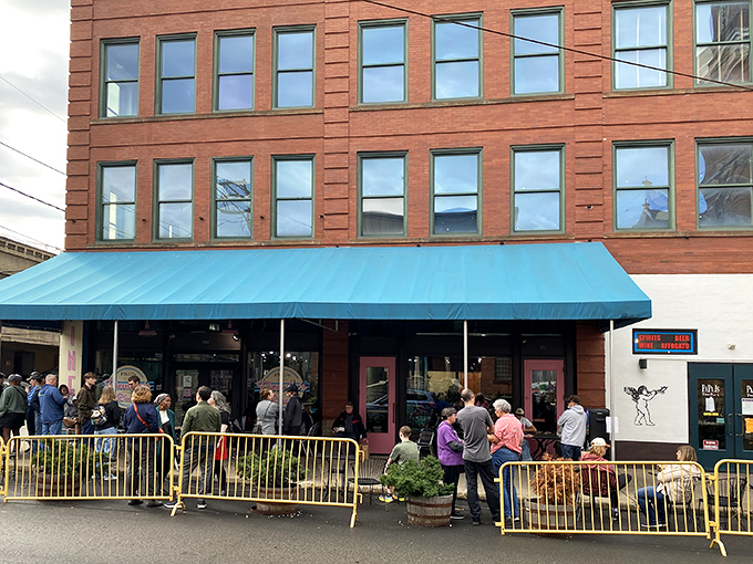 The blue awning and line of hungry patrons tell you everything: this isn't just breakfast, it's a Pittsburgh pilgrimage worth every minute of the wait.