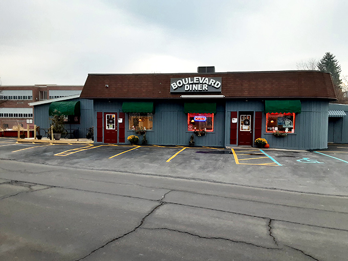 The Boulevard Diner's cheerful exterior, with its colorful pennant flags, stands as a beacon of breakfast hope on Wilkes-Barre's busy thoroughfare.