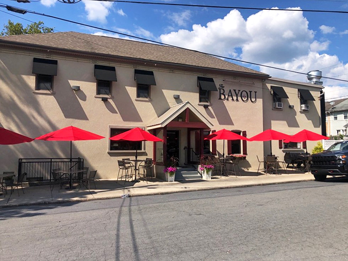 The unassuming white exterior of The Bayou might not stop traffic, but those bright red umbrellas are like little flags signaling "deliciousness happens here."