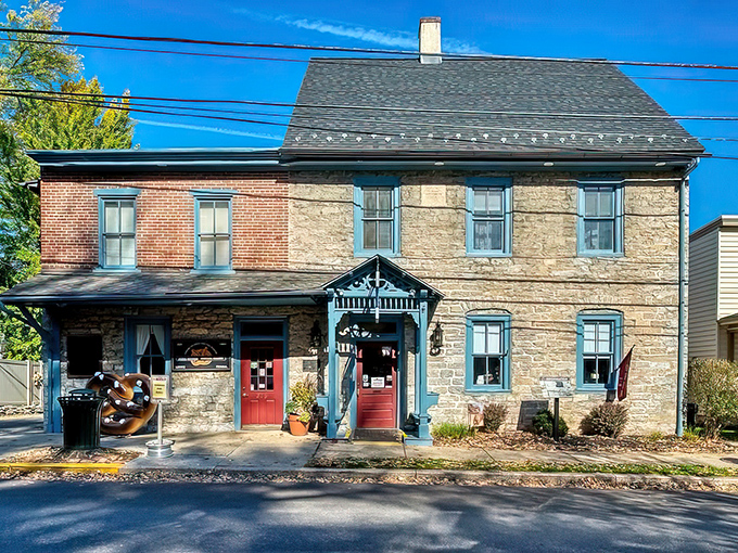 Stone meets brick in this architectural time capsule where America's pretzel obsession began. The blue trim and red doors practically wink at passersby.
