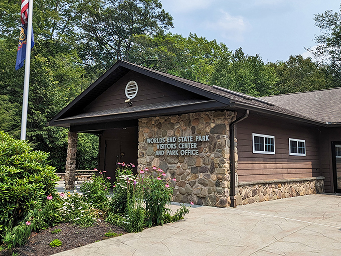 Nature's autumn fashion show is in full swing at Worlds End State Park, where picnic tables wait patiently for visitors beneath a canopy of golden maples.