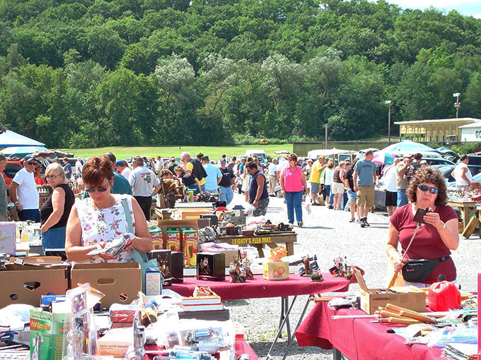 Treasure hunters browse vintage signs and framed memorabilia outside Rocky's, where yesterday's advertisements become today's coveted wall art.