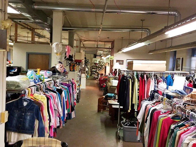 Racks upon racks of clothing stretch into the distance like a textile forest. This treasure hunter's paradise offers endless possibilities for the patient shopper.