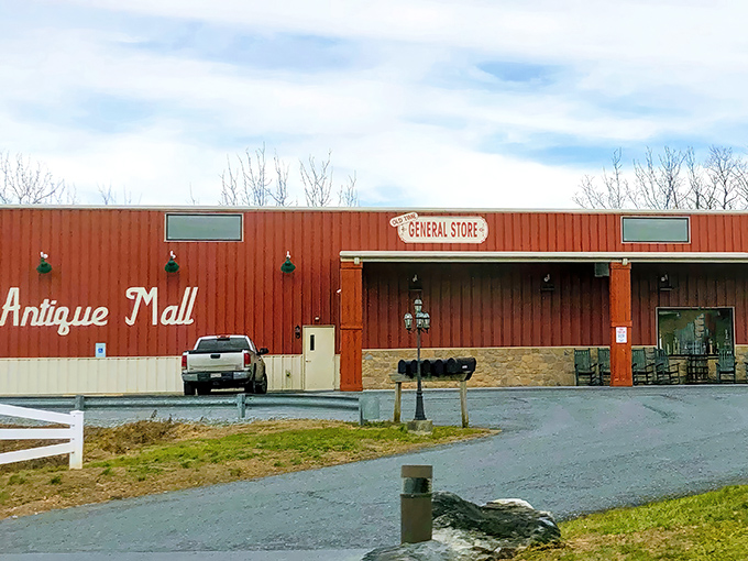 The iconic red exterior of Cackleberry Farm Antique Mall stands like a time machine in Paradise, beckoning treasure hunters with its rustic charm and promise of discoveries.
