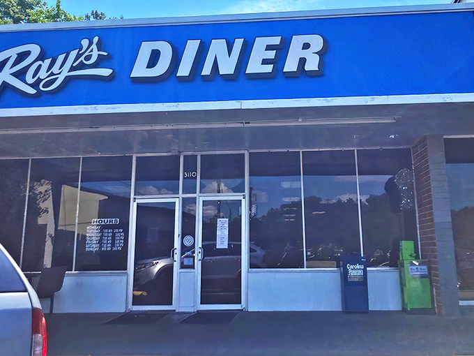 The blue-signed beacon of breakfast hope on Two Notch Road. Ray's Diner stands proudly against chain restaurant conformity, promising authentic Southern comfort without pretension.