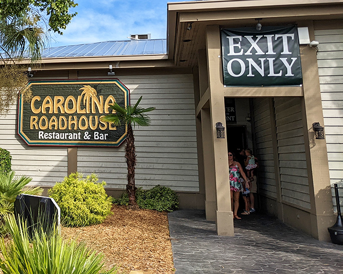 The unassuming exterior of Carolina Roadhouse hides culinary treasures within, like finding a secret speakeasy that serves prime rib instead of bathtub gin.