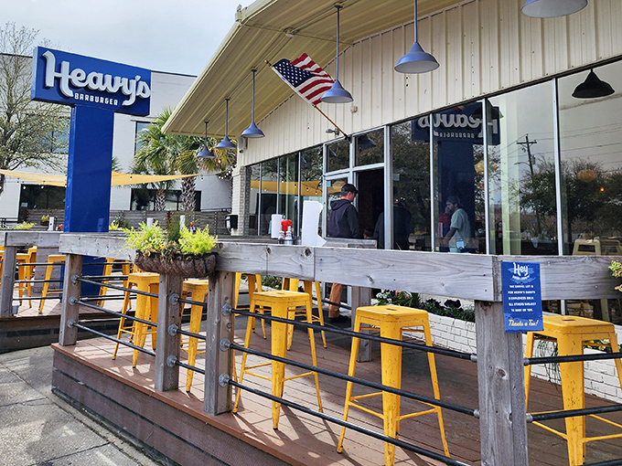 The blue sign beckons like a lighthouse for the hungry&mdash;Heavy's Barburger's unassuming exterior hides culinary treasures within.