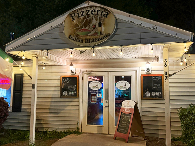 The unassuming exterior of Rizzo's might fool you, but those string lights are practically whispering, "Come inside for the good stuff."