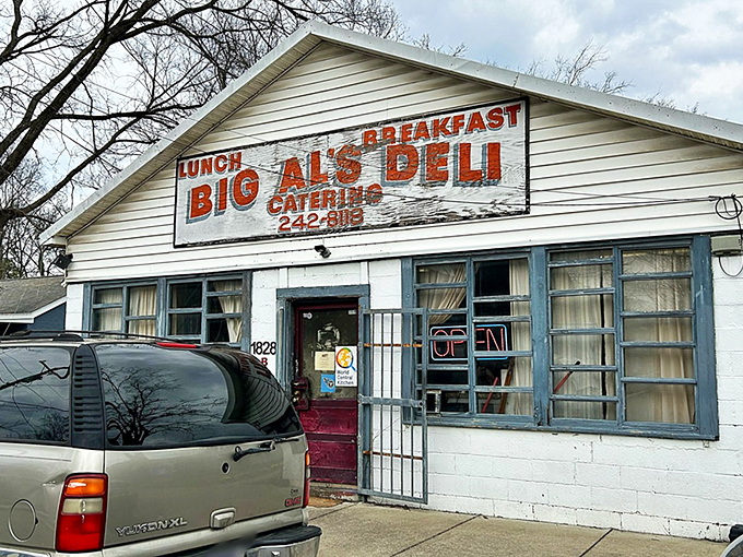 The unassuming white building with bold orange signage stands as Nashville's breakfast fortress, where culinary magic happens without pretense.