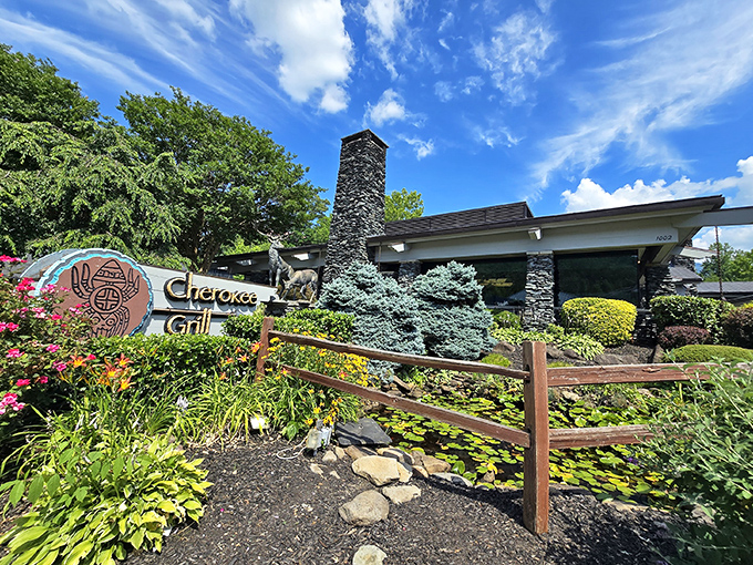 Stone pillars that mean business! Cherokee Grill's rustic mountain lodge exterior promises what every hungry traveler hopes for&mdash;authenticity with a side of comfort.