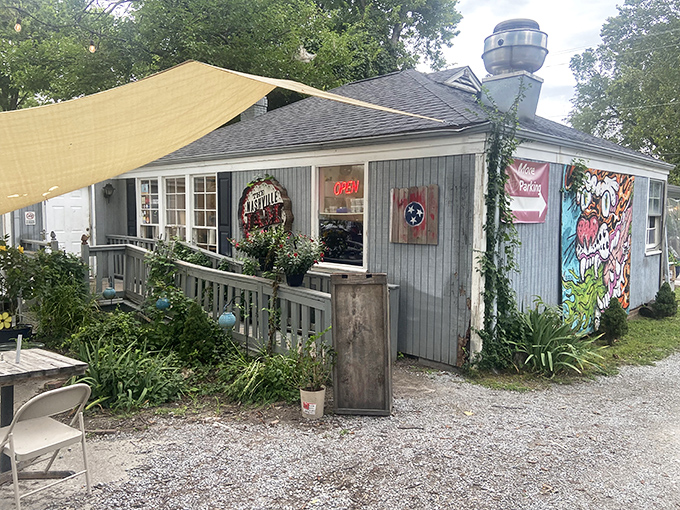 The unassuming gray exterior of Nashville Jam Co. is like finding a secret breakfast club where the password is "hungry" and everyone gets in.