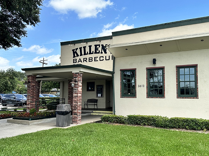 The unassuming exterior of Killen's BBQ stands like a temple to Texas smoking traditions, promising transcendent meat experiences within its humble walls.