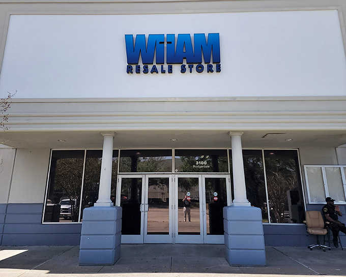 The iconic blue WHAM sign welcomes treasure hunters like a beacon of secondhand possibility. Behind those doors? Pure thrifting magic awaits.