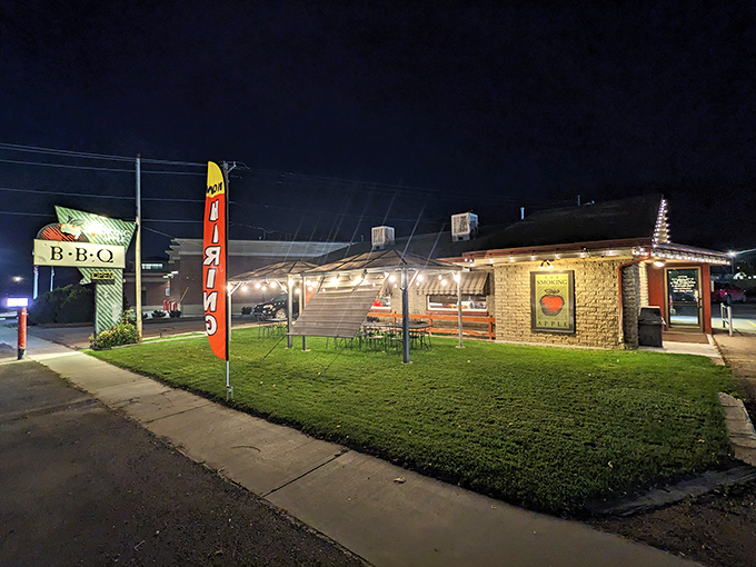The promise of transcendent barbecue awaits in this unassuming brick building, where Utah's Wasatch Mountains provide the perfect dramatic backdrop for smoke-fueled culinary magic.