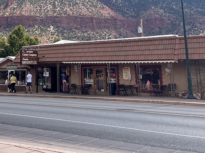Where red rock majesty meets sweet tooth paradise. Springdale Candy Company's charming storefront sits perfectly framed by Zion's towering cliffs.