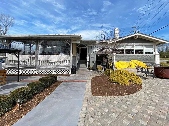 Sunny skies and a welcoming patio await as you arrive for a relaxing meal at this charming, cottage-style neighborhood eatery.