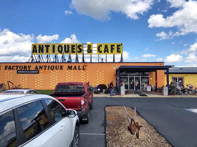 The bright yellow exterior of Factory Antique Mall stands like a beacon for treasure hunters, promising adventures that'll make your local flea market seem like amateur hour.