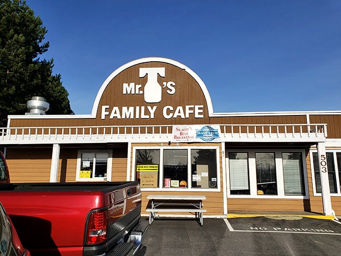 The arched brown exterior of Mr. T's stands like a beacon of breakfast hope along the highway, promising pancake perfection within those humble walls.