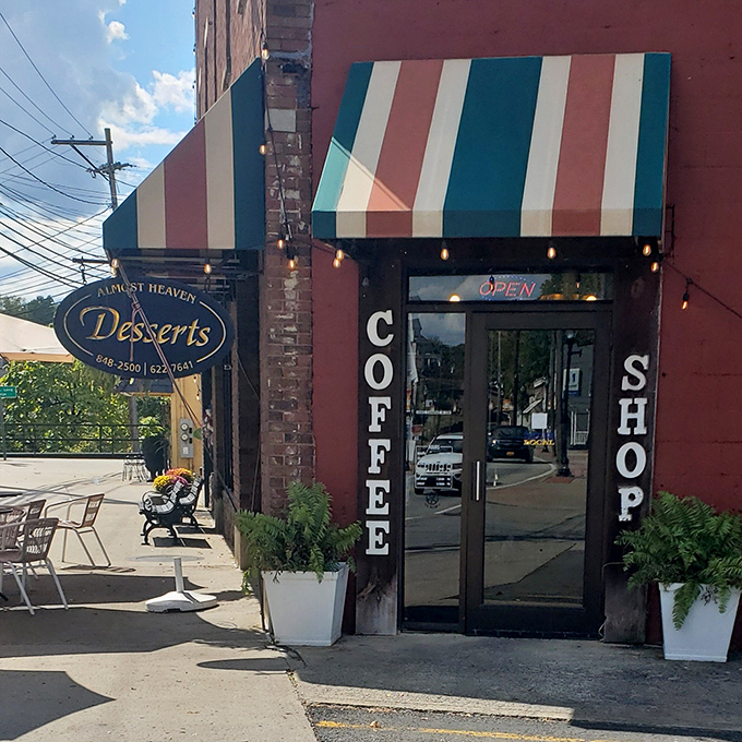 The colorful striped awning beckons like a dessert rainbow, promising sweet treasures inside this charming Bridgeport brick storefront.