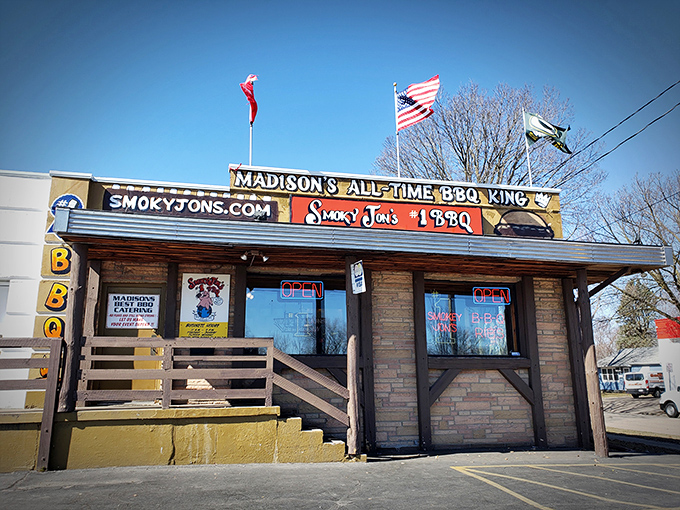 The unassuming exterior of Smoky Jon's proudly declares itself "Madison's All-Time BBQ King" – a bold claim backed by decades of smoke-infused excellence.