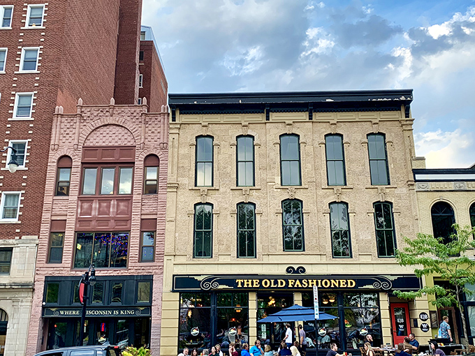 The Old Fashioned stands proudly on Madison's Capitol Square, a historic building that seems to whisper, "Come inside, we have cheese waiting for you."