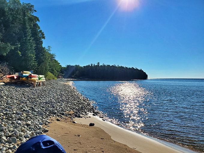 Where the horizon meets the water in a perfect blue embrace. Lake Michigan's vastness creates an ocean-like illusion that makes you forget you're in the Midwest.