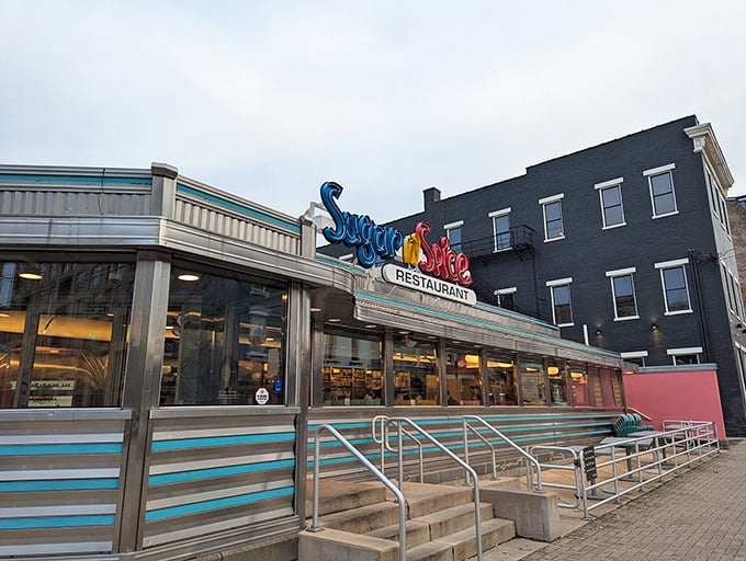 That iconic neon sign beckons like a beacon of breakfast hope. Sugar n' Spice's OTR location brings retro charm to Cincinnati's urban landscape.