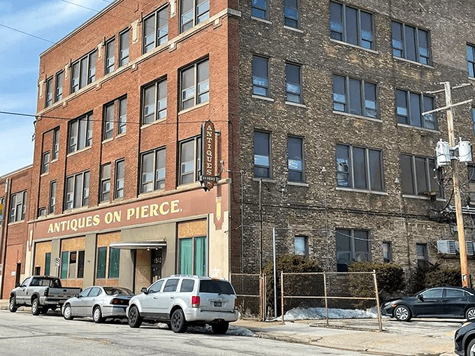 The brick fortress of forgotten treasures stands proudly on Pierce Street, a time capsule disguised as a building in Milwaukee's industrial district.