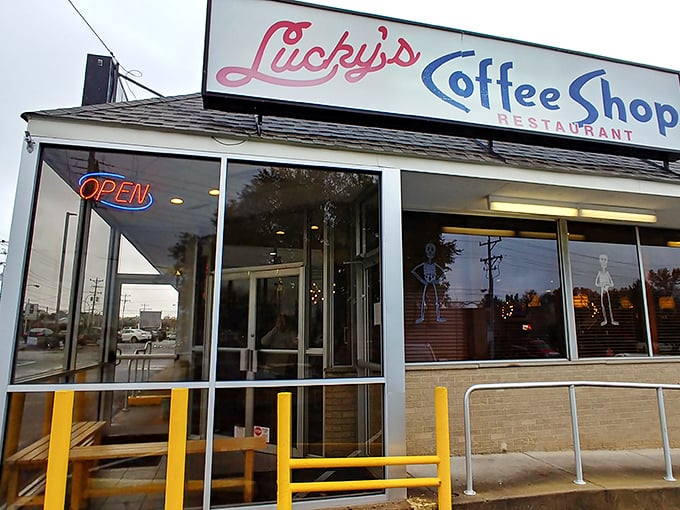 That iconic pink and blue sign beckons like a neon promise of comfort food nirvana. Lucky indeed are those who step inside.