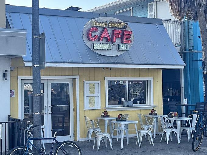 The cheerful yellow exterior of Beach Shanty Cafe beckons like a sunrise, promising breakfast treasures just steps from Clearwater's famous white sands.
