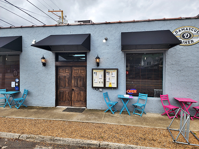 The unassuming blue exterior of Damascus Diner stands like a quiet promise &ndash; extraordinary flavors await inside this Trail Town USA landmark.