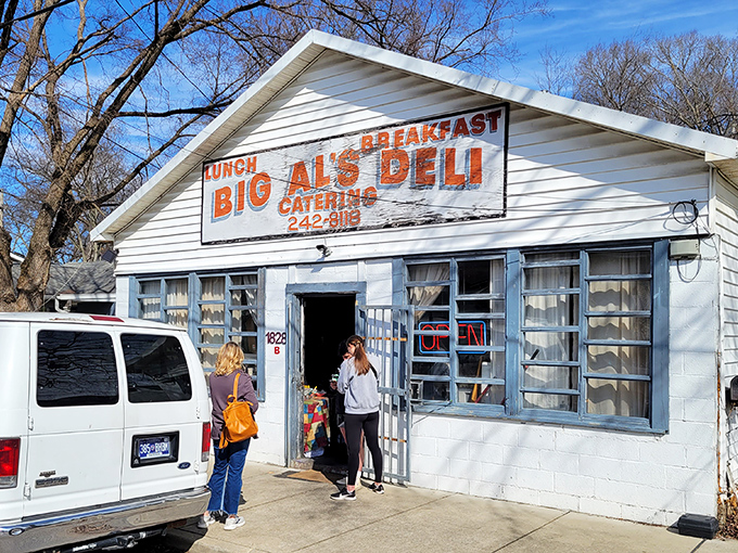 The unassuming white building with bold orange signage stands as Nashville's breakfast fortress, where culinary magic happens without pretense.