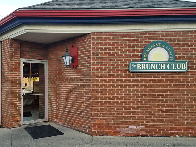 The unassuming brick exterior of The Brunch Club hides a breakfast paradise within, like finding a treasure chest disguised as an ordinary box.