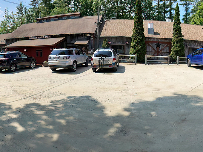 The Corn Crib gift shop welcomes you with rustic charm and colorful flower decorations. Your maple syrup journey begins before you even reach the pancakes!