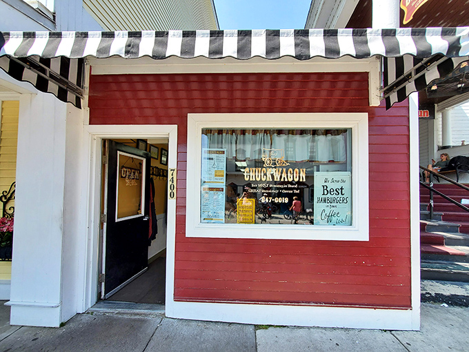 The little red diner that could! The Chuckwagon's modest exterior with its classic striped awning promises big flavors inside this Mackinac Island gem.