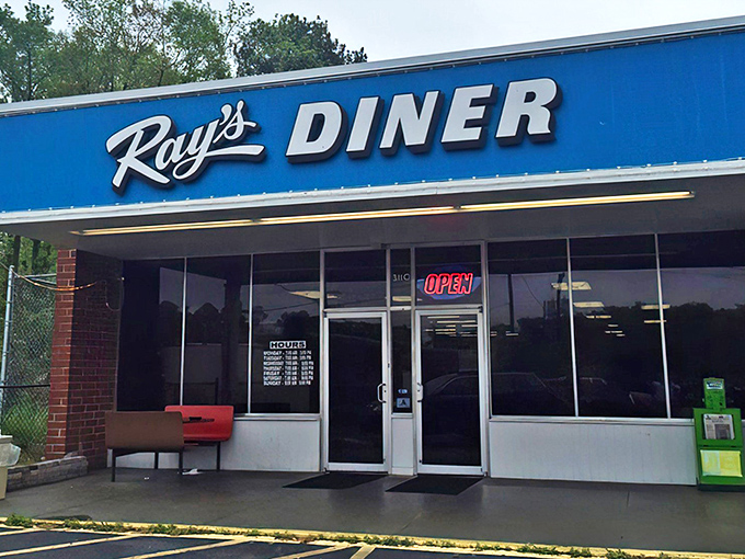 The blue-signed beacon of breakfast hope on Two Notch Road. Ray's Diner stands proudly against chain restaurant conformity, promising authentic Southern comfort without pretension.