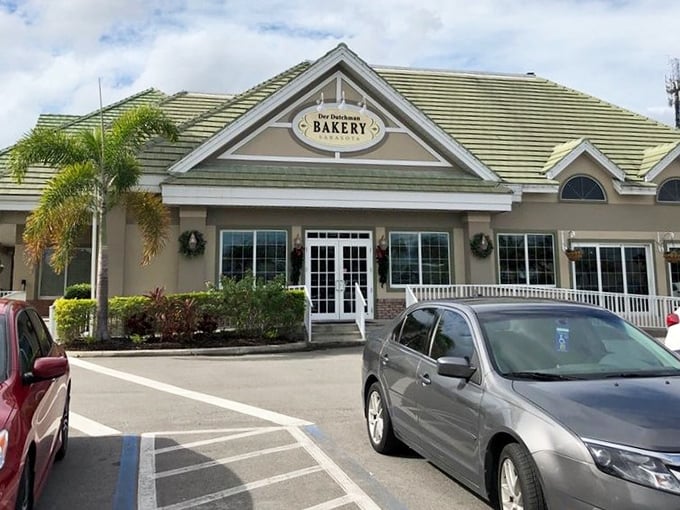 The welcoming sign of Der Dutchman stands like a beacon of butter-based hope amid Florida's palm trees. Amish paradise found!