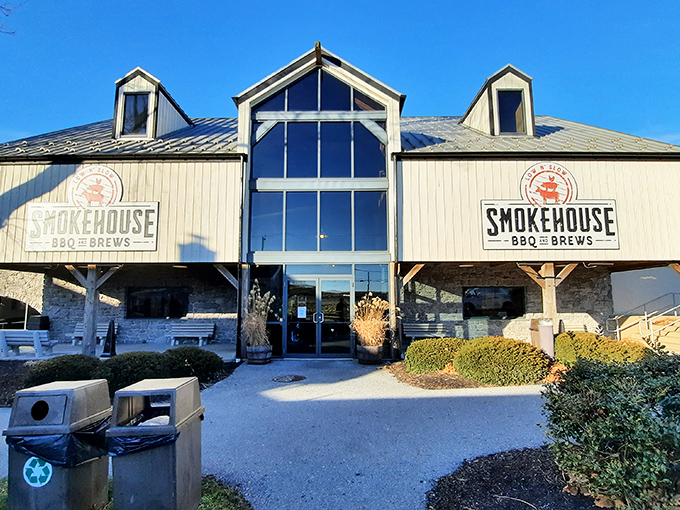 The rustic charm of Smokehouse BBQ & Brews beckons from the roadside like a siren song for meat lovers navigating the rolling hills of Amish Country.