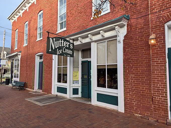 The historic red brick fa&ccedil;ade of Nutter's Ice Cream stands like a sweet sentinel in downtown Sharpsburg, promising cold comfort since 1996.