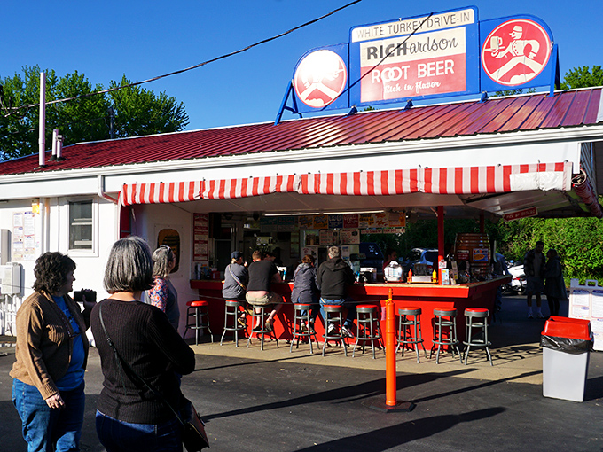 The iconic White Turkey Drive-In stands proudly with its red roof and striped awnings, a time capsule of Americana serving happiness on a tray since generations.