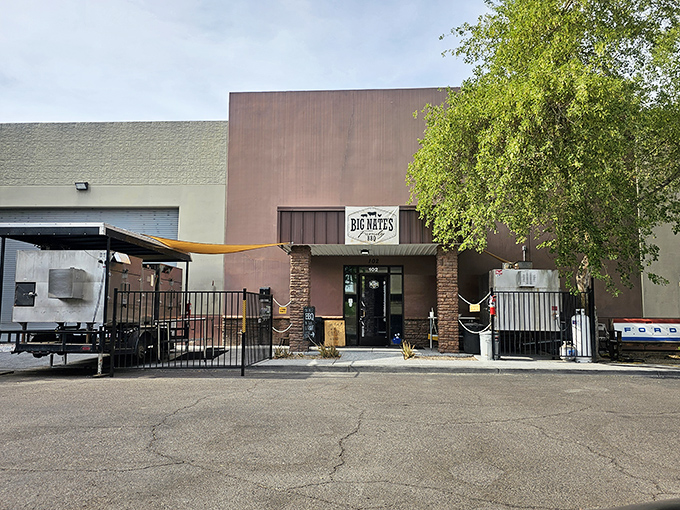The unassuming entrance to flavor paradise. Like finding a secret door to Narnia, but instead of talking lions, you get transcendent brisket.