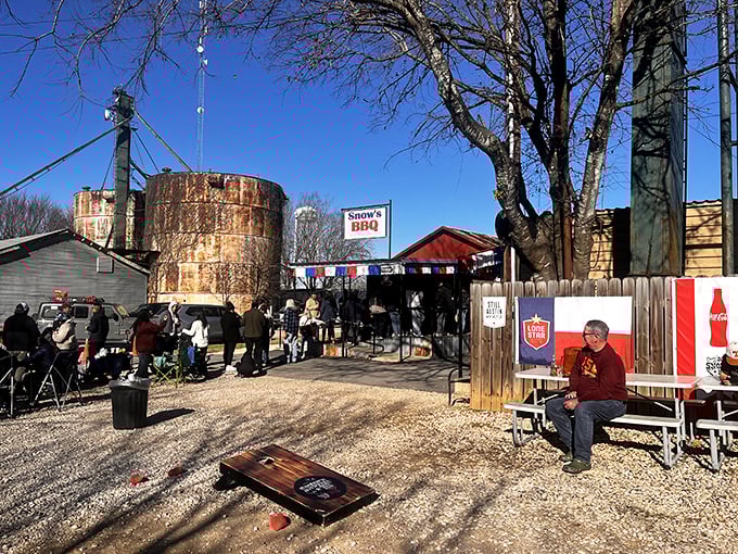 The pilgrimage begins here &ndash; rustic smokers, weathered wood, and that iconic water tower standing like a barbecue lighthouse guiding hungry souls home.