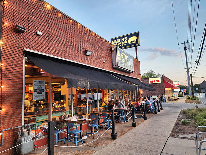 The red brick exterior of Martin's Bar-B-Que Joint beckons hungry pilgrims with its no-nonsense fa&ccedil;ade and the promise of smoky delights within.