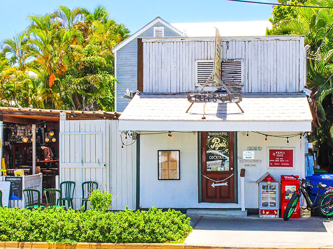 The white picket fence and vintage lamp post aren't just charming decor&mdash;they're time machines to Old Florida, where bicycles outnumber BMWs.