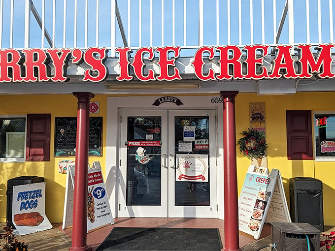 The cheerful yellow facade of Larry's beckons like a dessert lighthouse, promising sweet salvation from Florida's relentless heat.