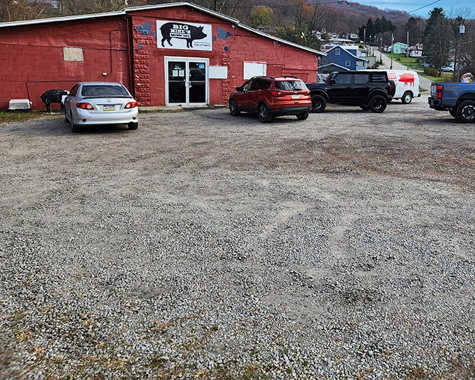 The unassuming red exterior of Big Mike's might not scream "culinary destination," but that smoky aroma wafting through the parking lot tells the real story.