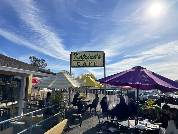 The sunny yellow exterior of Katrina's Caf&eacute; welcomes you like an old friend, complete with colorful umbrellas that practically whisper, "Come sit awhile."